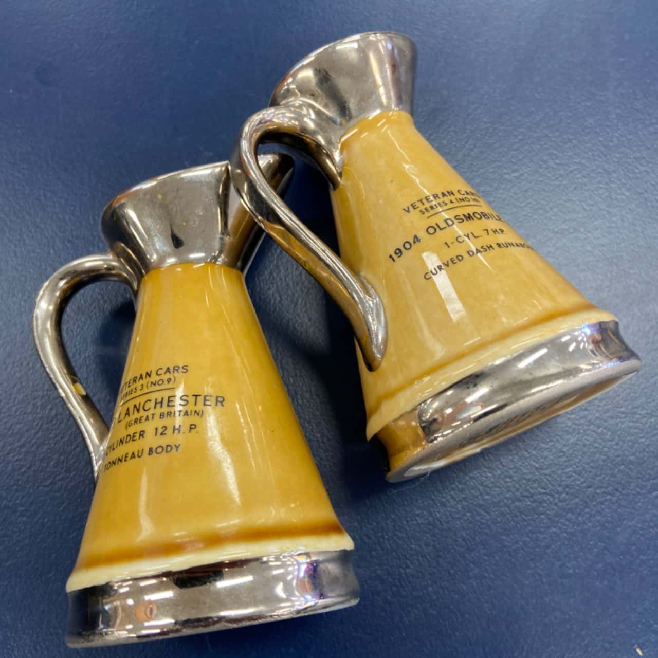 2 small Wade jugs . Vintage Car Club of Great Britain (s)