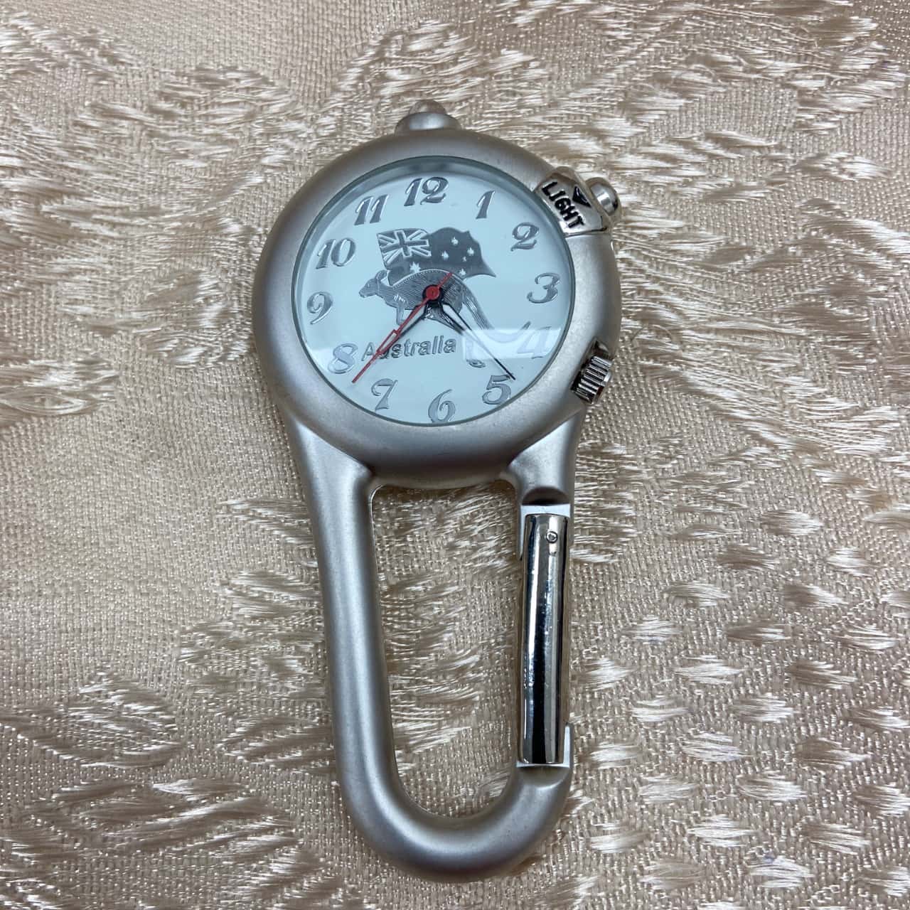 Mens silver coloured caribeener clip watch with light(s)