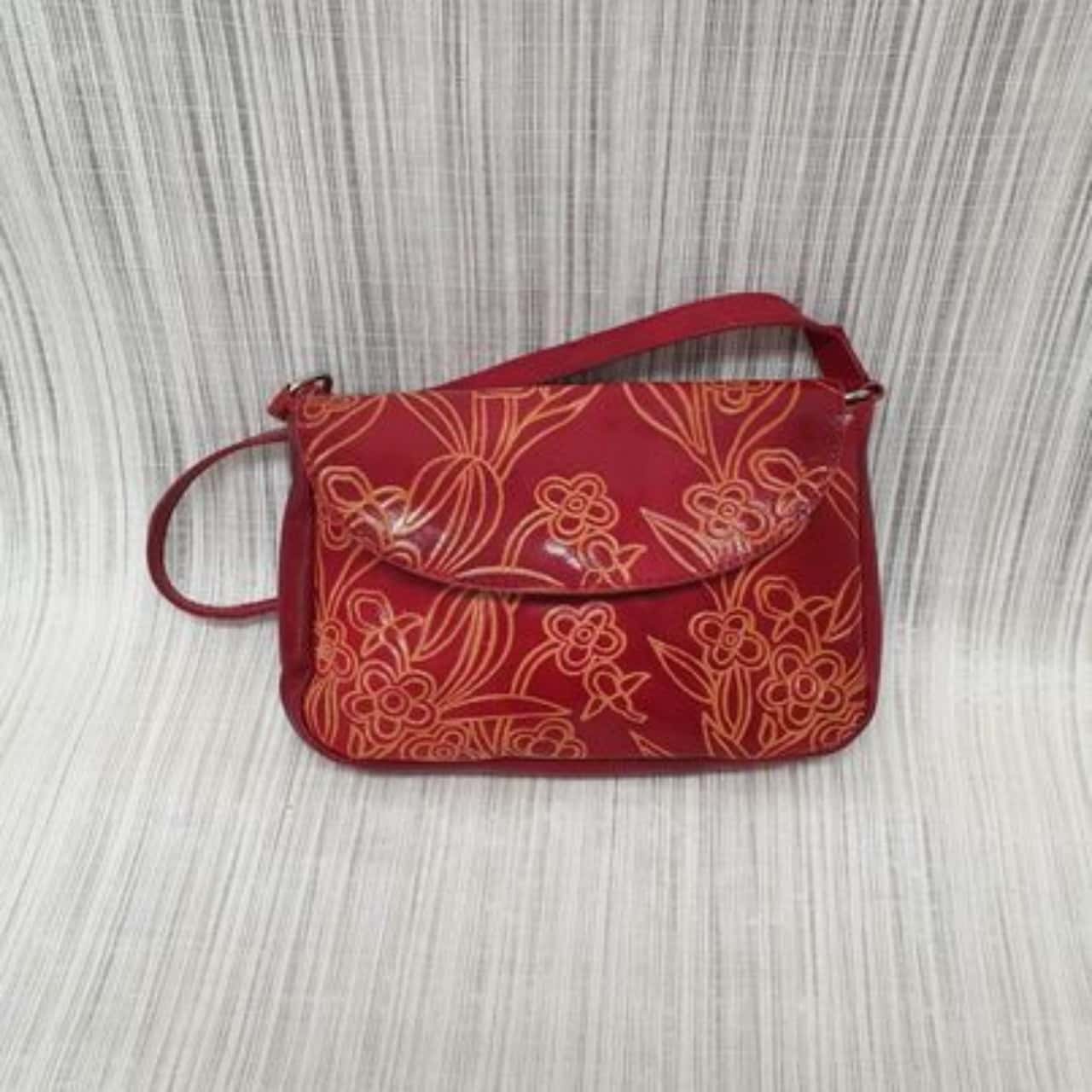 Sequel Carved Flowers on Gorgeous Quality Red Leather Made In India ...