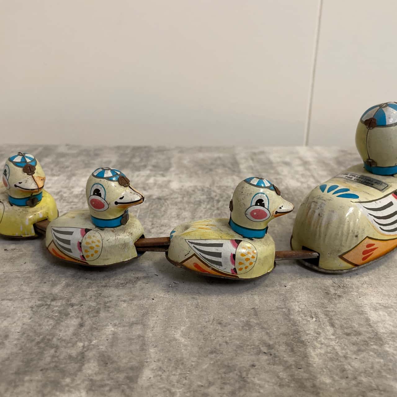 Vintage tin wind up ducks