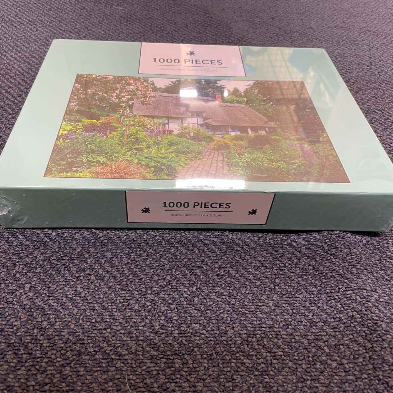 Target 1000 piece puzzle. Thatched cottage.(s)