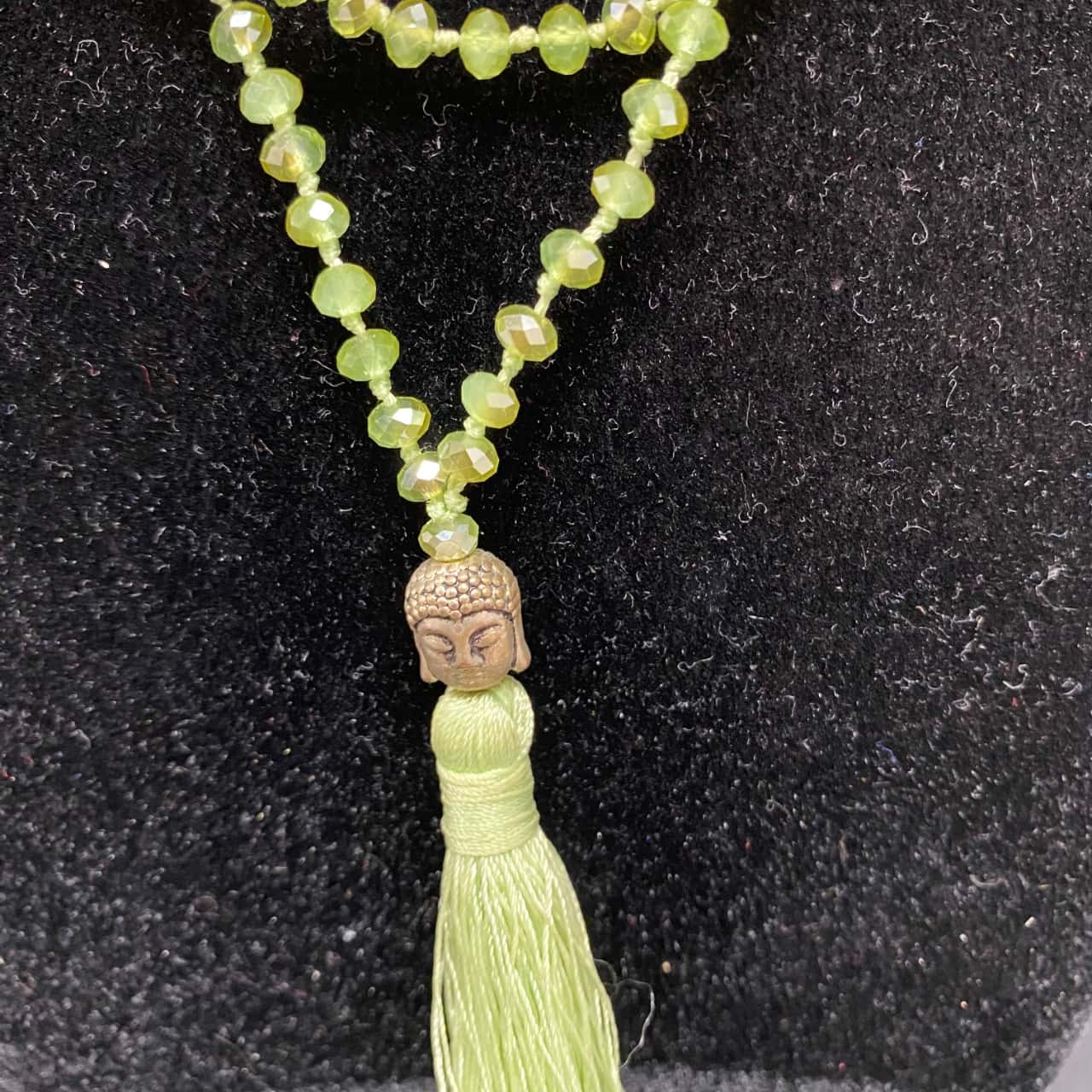Womens Green Bead and Tassel Necklace With Feature Buddha bead.
