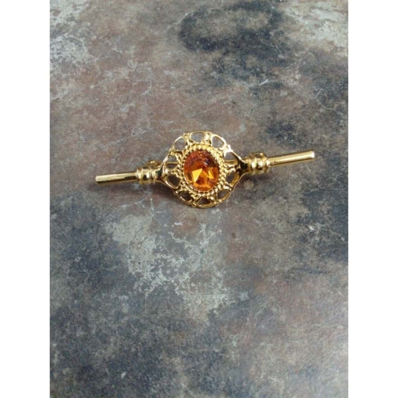 Golden Stoned Brooch