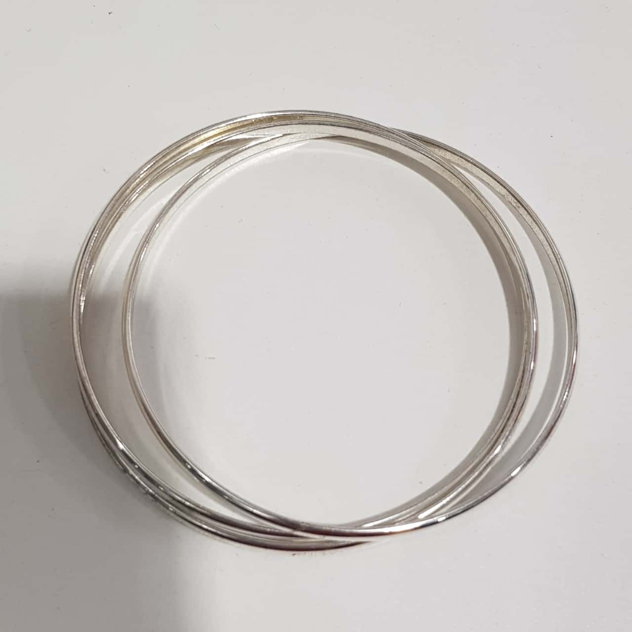 Guess 3 Piece Interlocking Bangle(s)