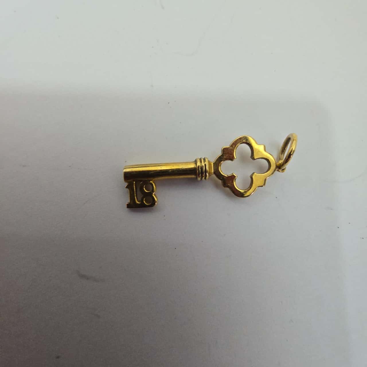 9 CT Yellow Gold Signet Ring and 18 key Charm