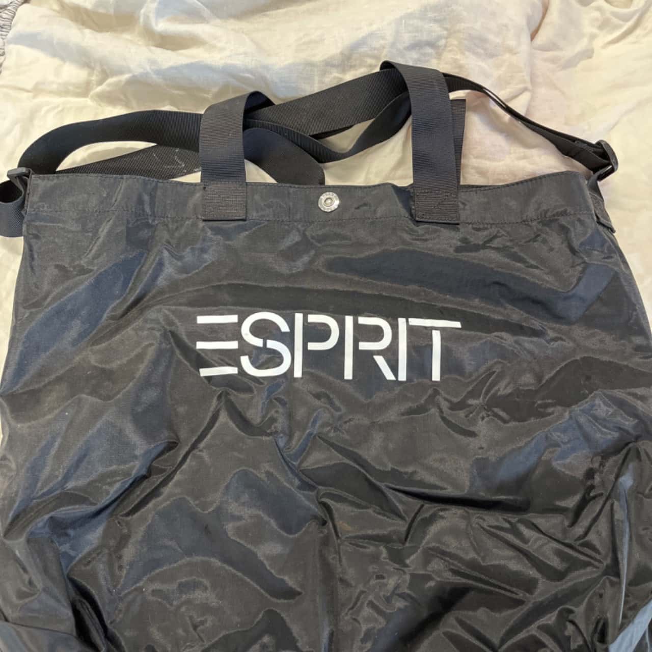 Esprit Black tote with adjustable shoulder strap and loop handles. (s)