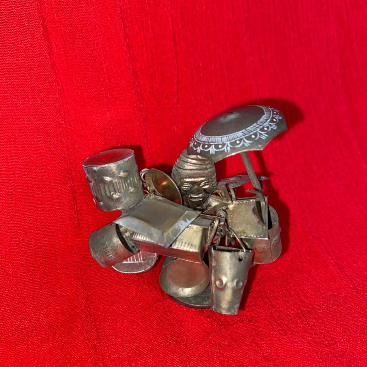 Peru/Bolivian Sterling Silver “Deity of Abundance” figurine on a coin 1939