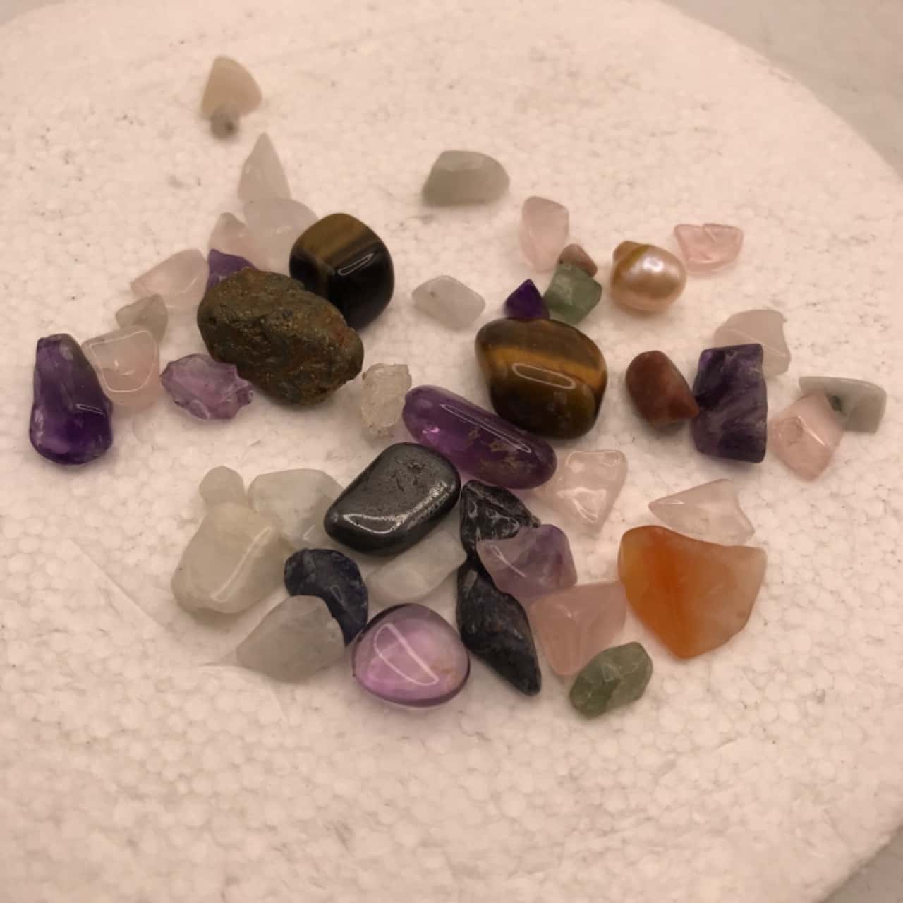 Over 40 Small Polished Gemstones in New Zealand Souvenir Paua Shell ...