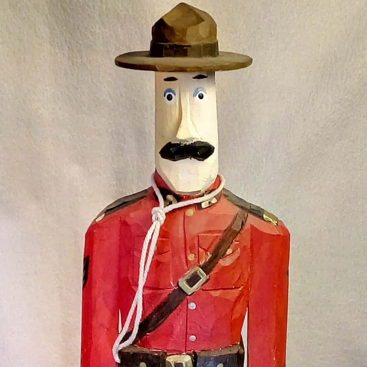 WOODEN MOUNTIE STATUE(s)