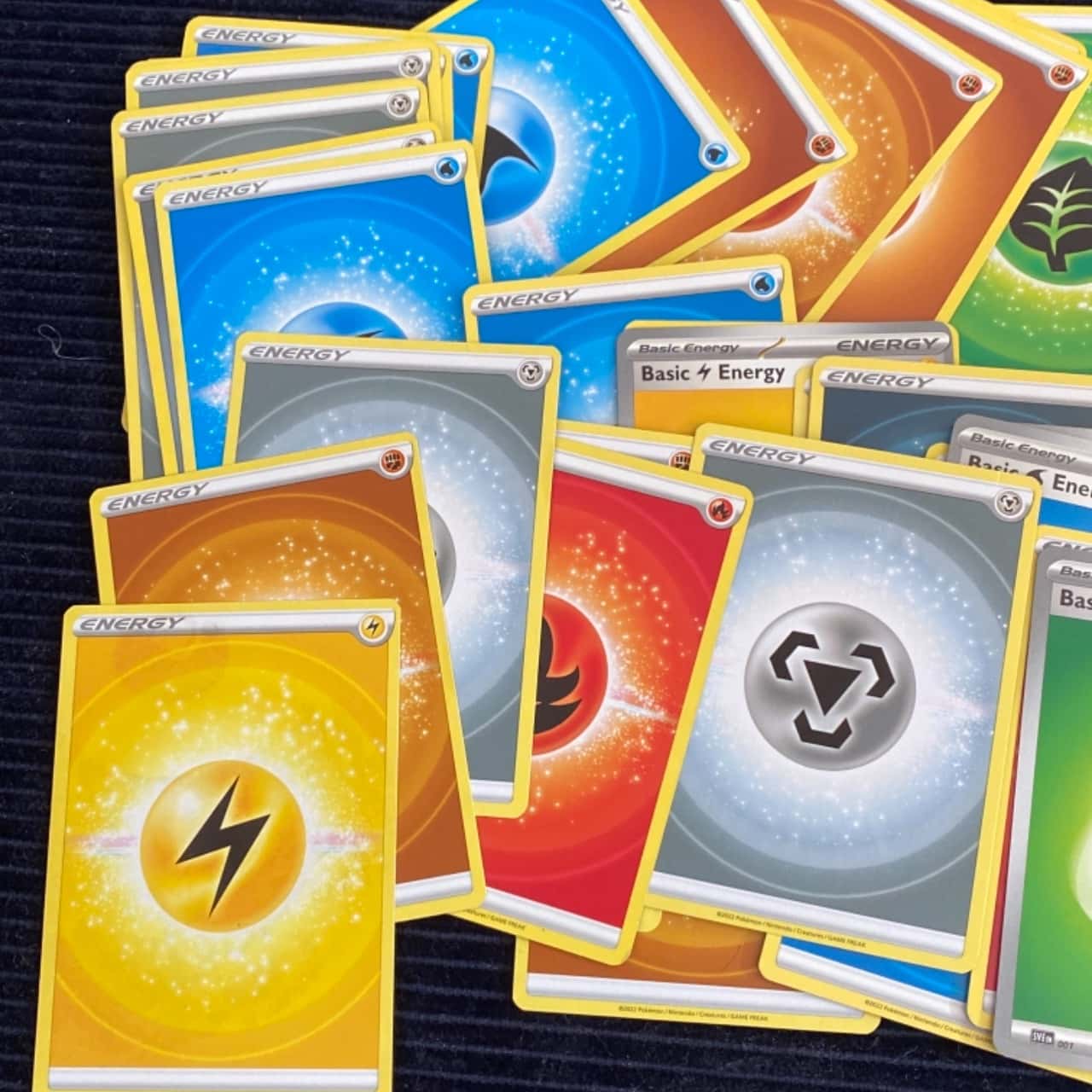 55 energy Pokémon cards + V star card