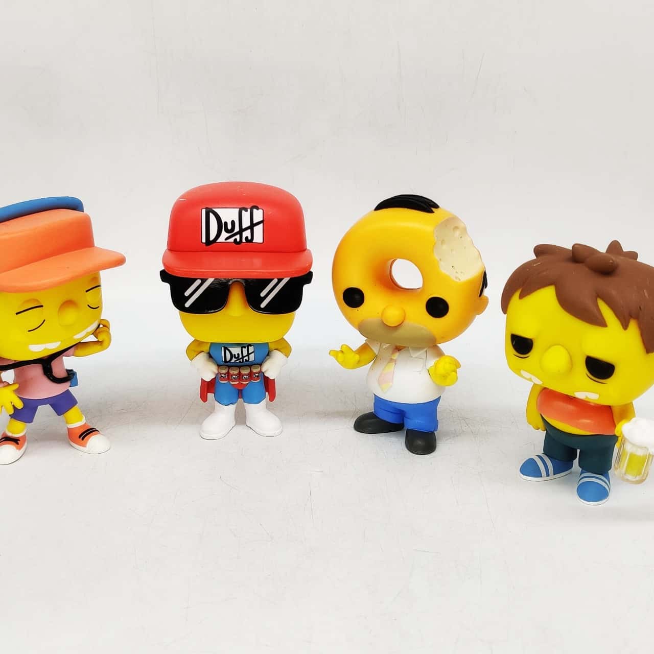 Simpsons FUNKO Pop Set of 4 Duff Man, Barney, Donut Homer and Otto-1616139