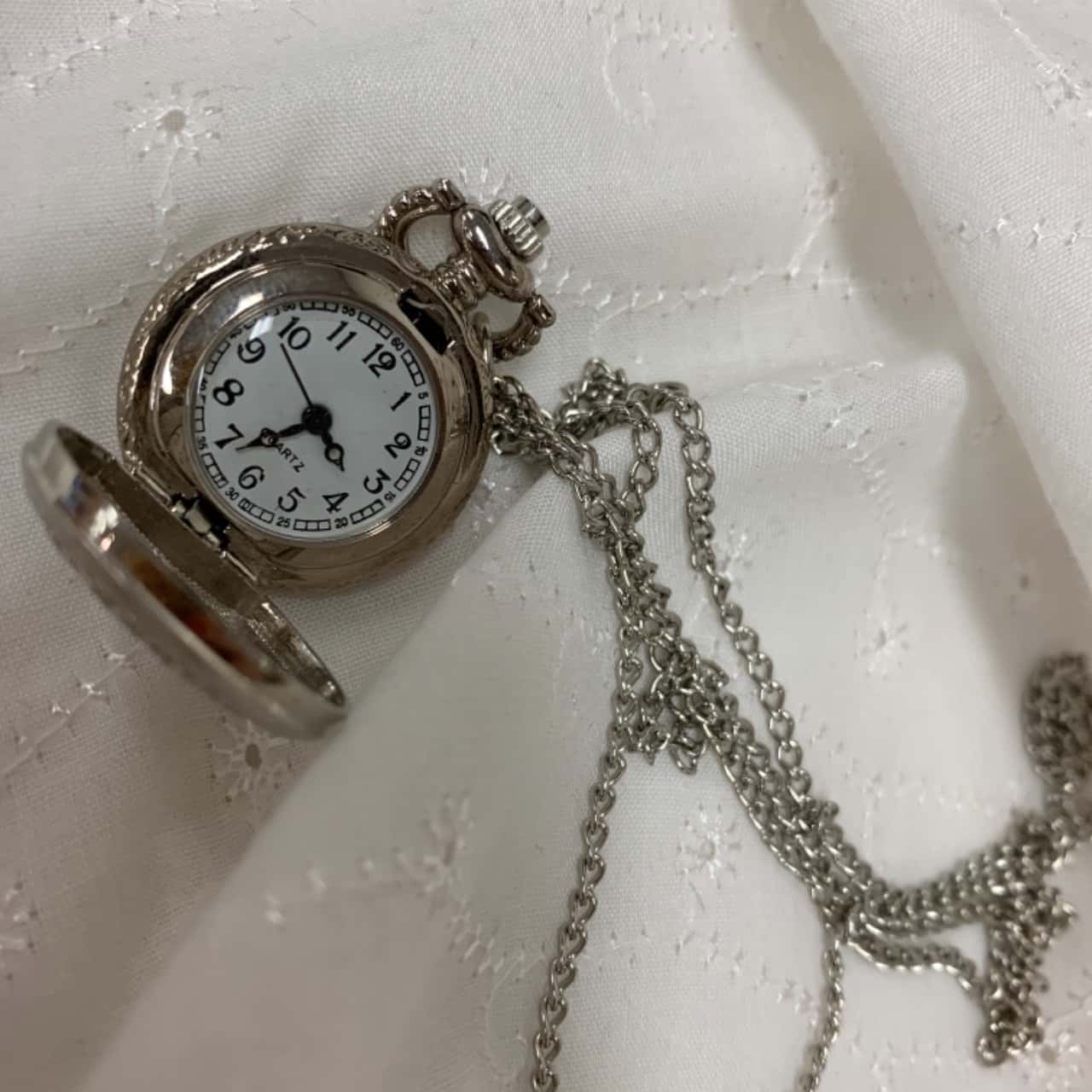 Decorative mini silver quartz pocket watch on chain (s)