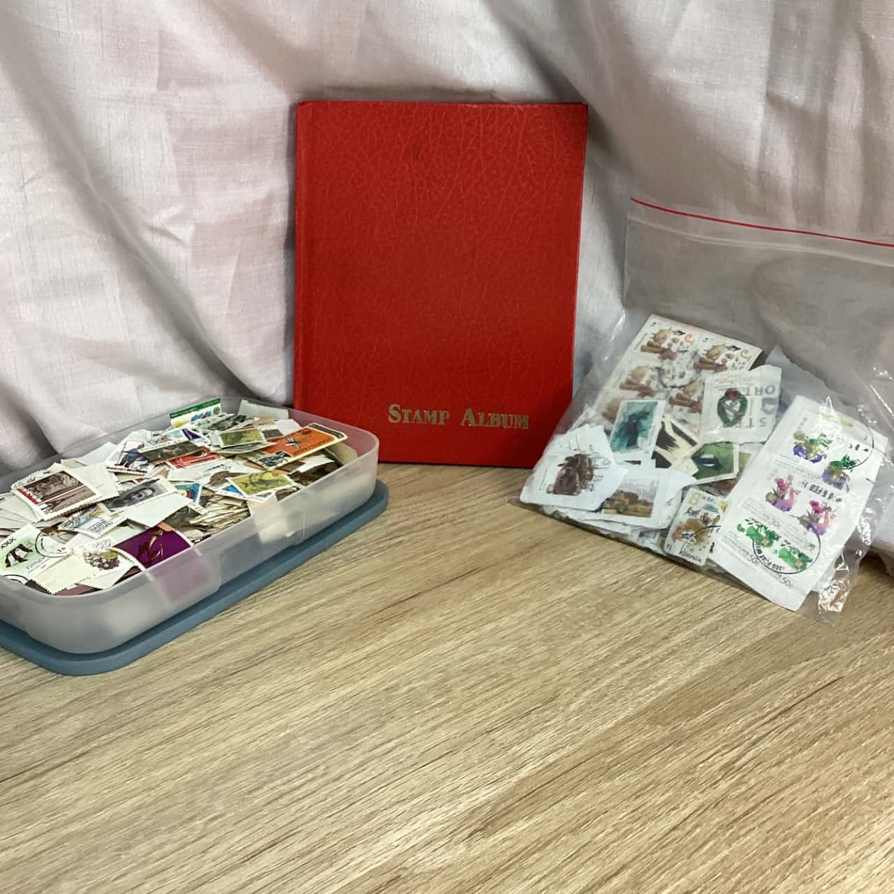 Stamp Album full with stamps from Australia and across the world(s)