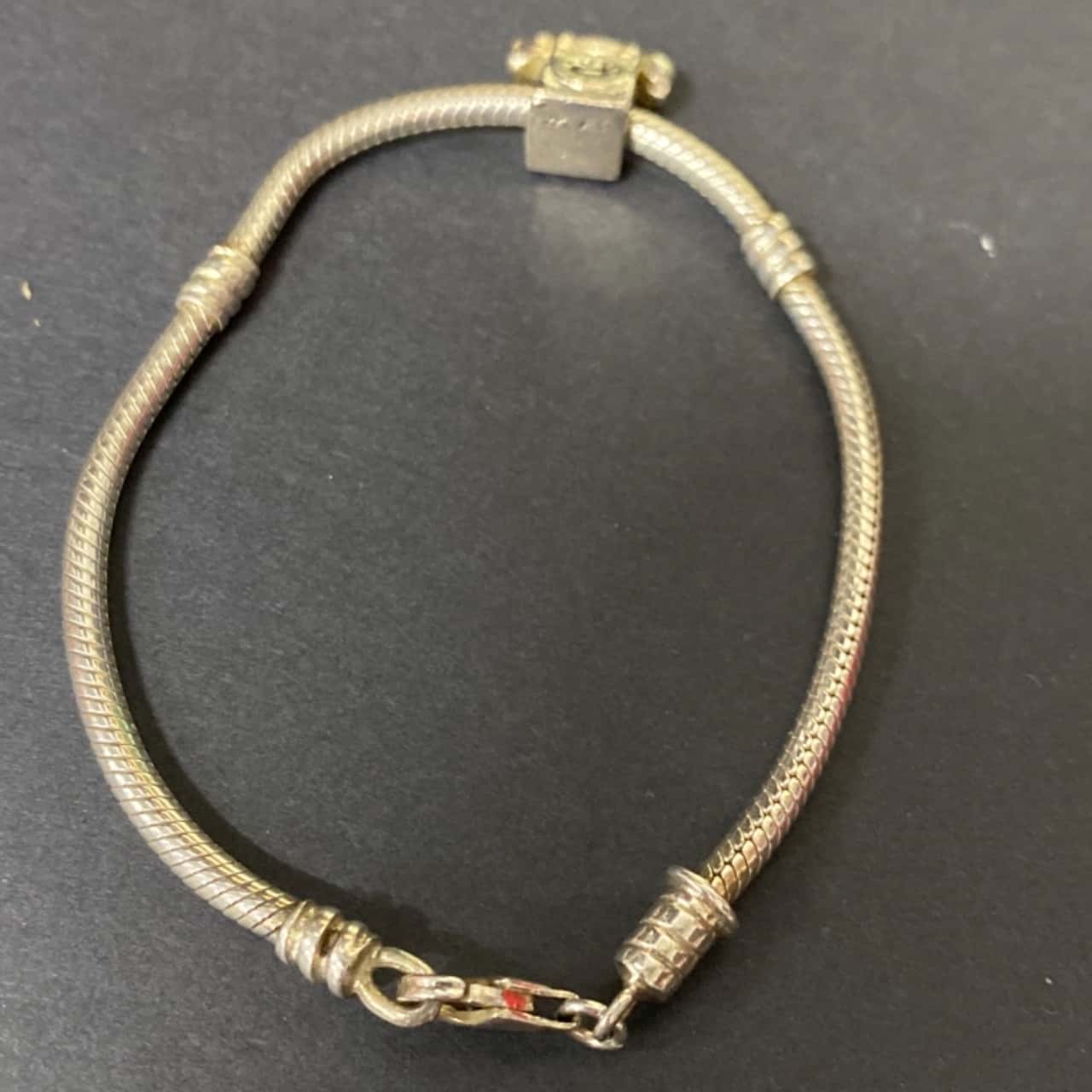 Sterling silver bracelet with charm