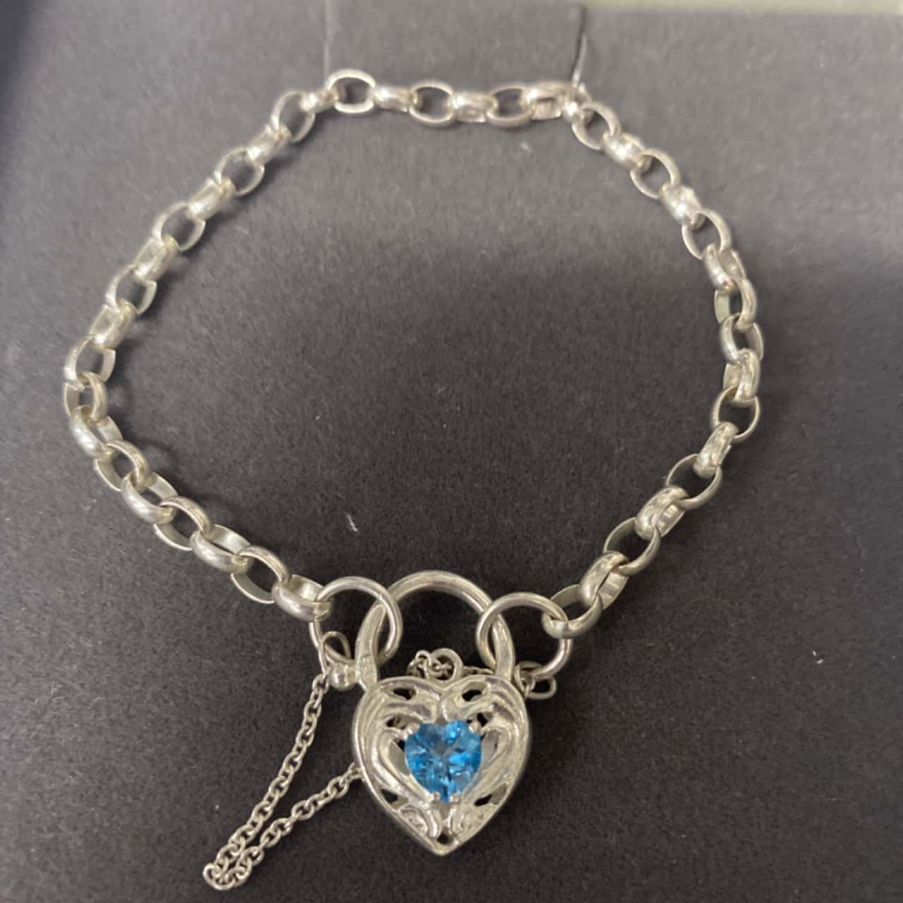 Sterling silver padlock bracelet with blue stone