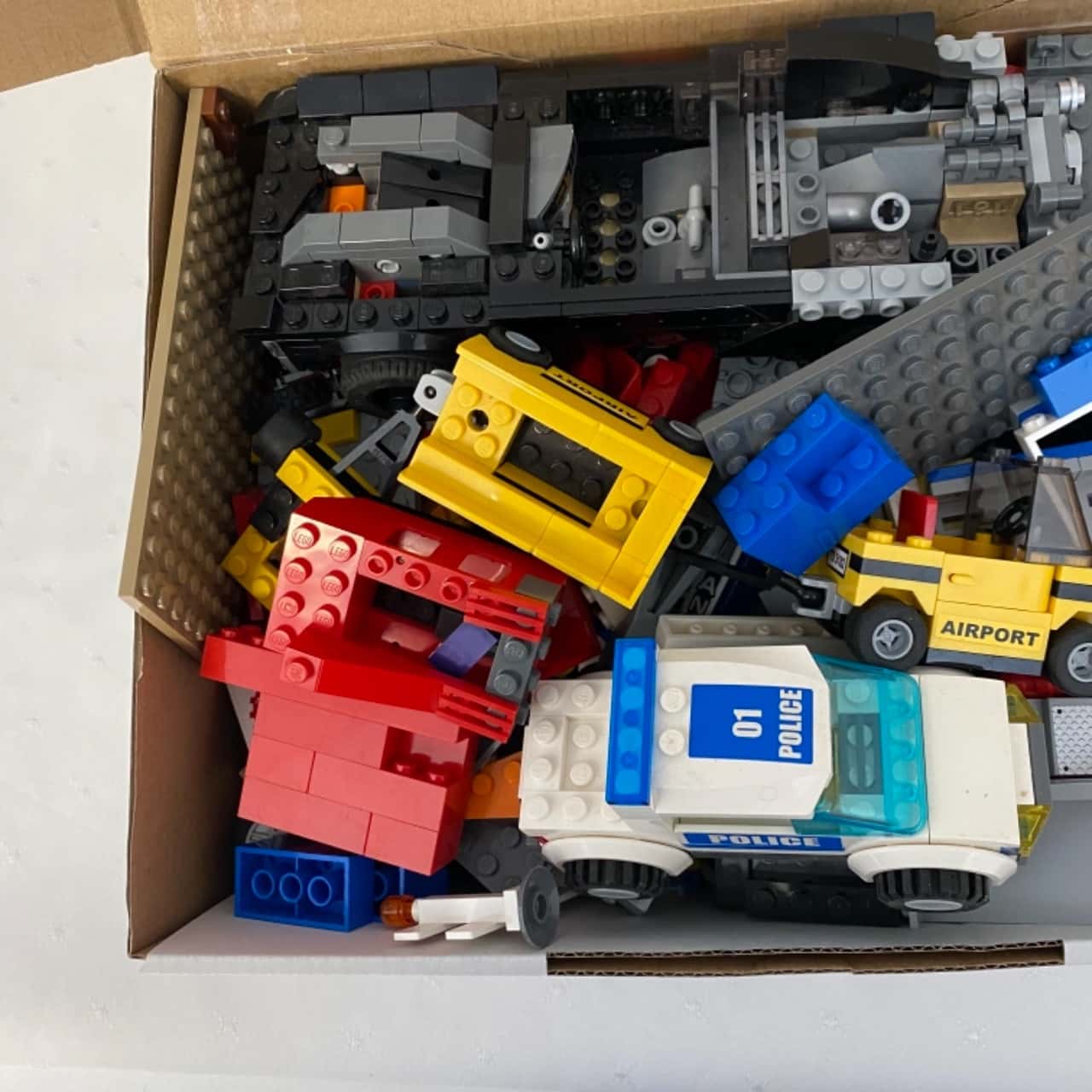 Box of Lego Cars(s)