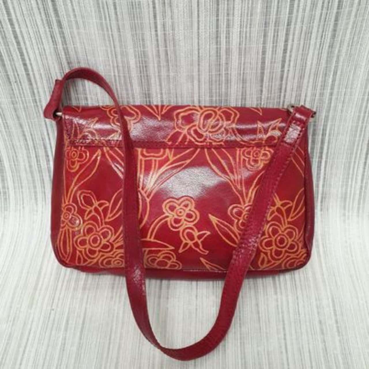 Sequel Carved Flowers on Gorgeous Quality Red Leather Made In India ...