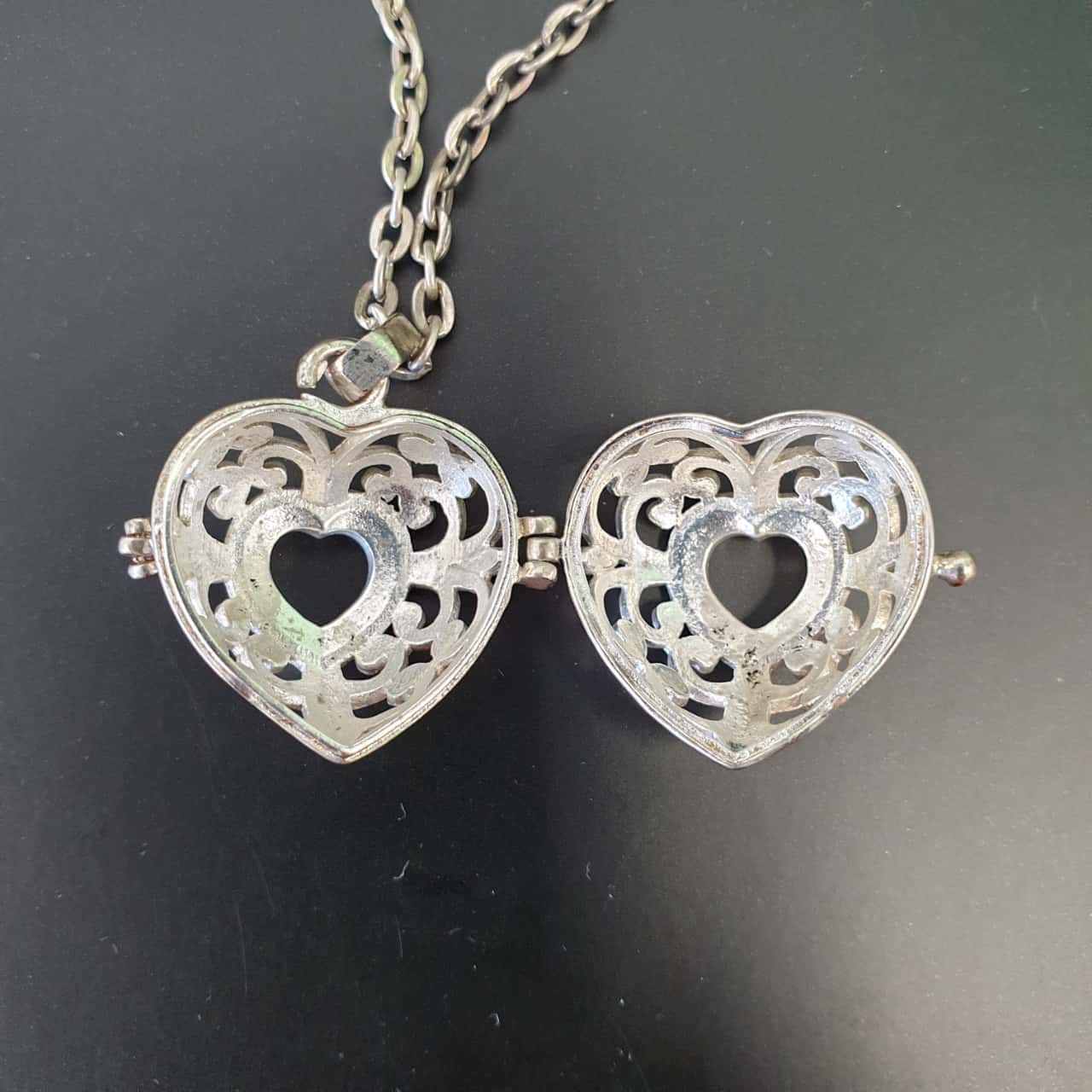 Womens Silver Plate Hollow Cage Locket with Chain. (s)