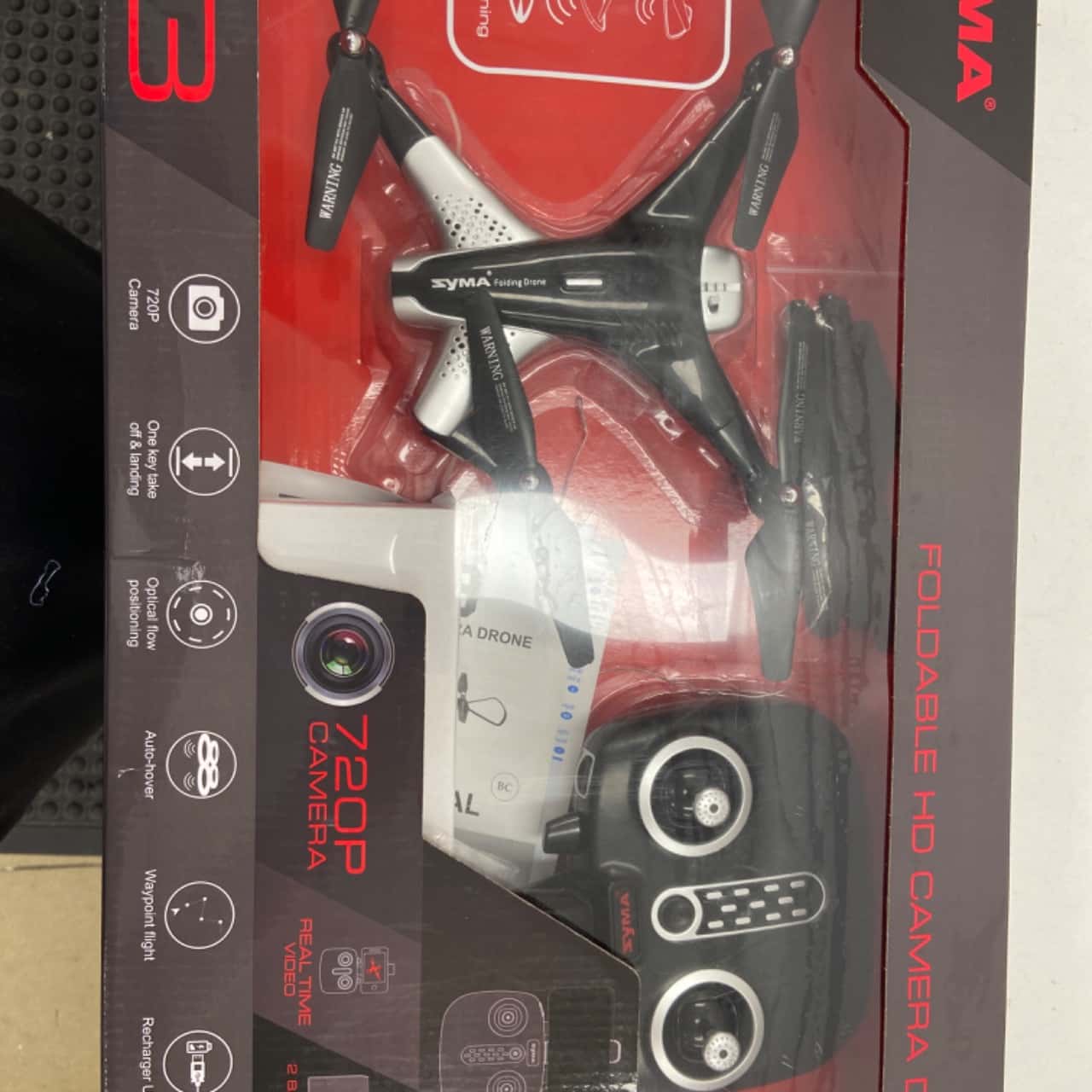 SYMA foldable HD camera drone , boxed in working order