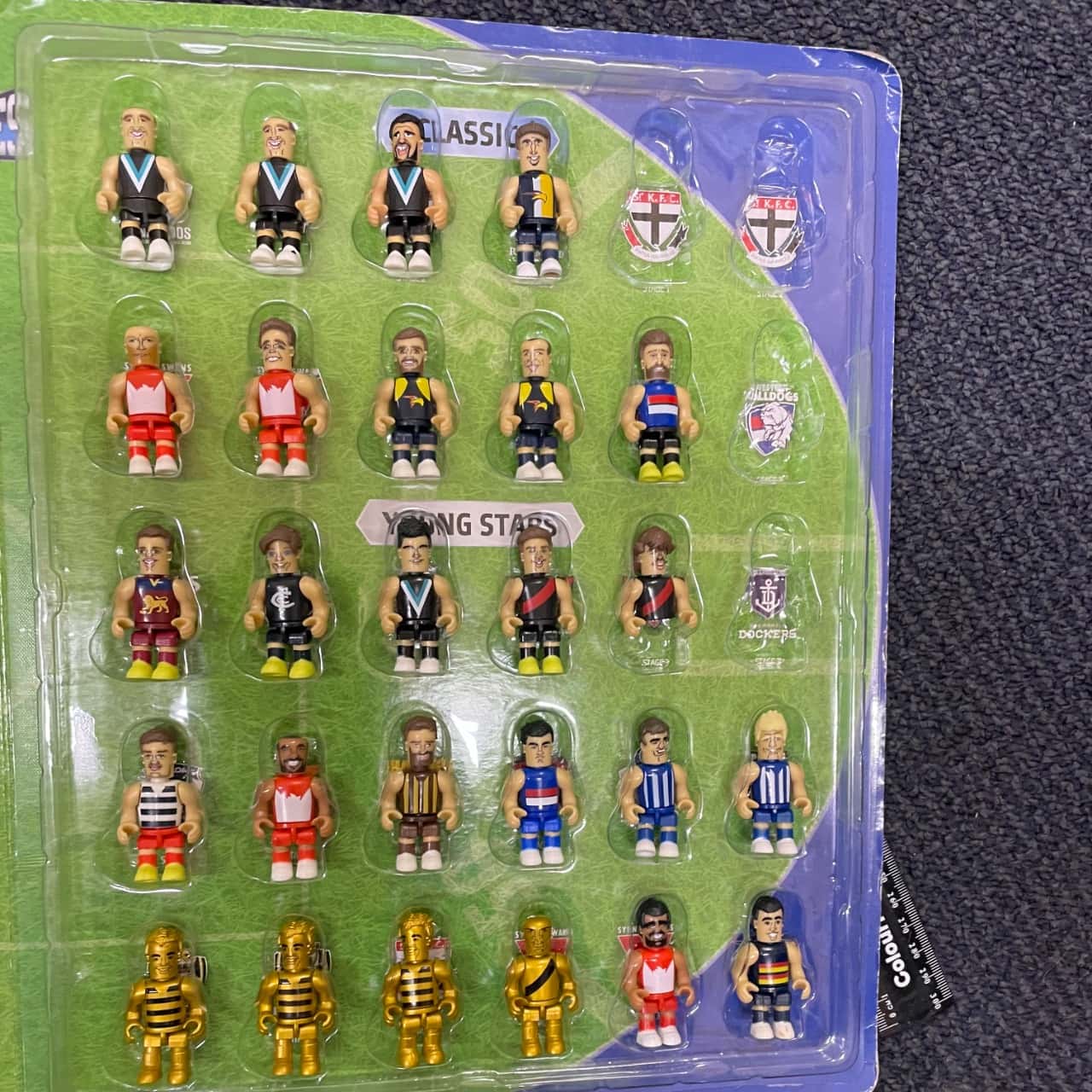 AFL Mini Figures in an Album.(s)