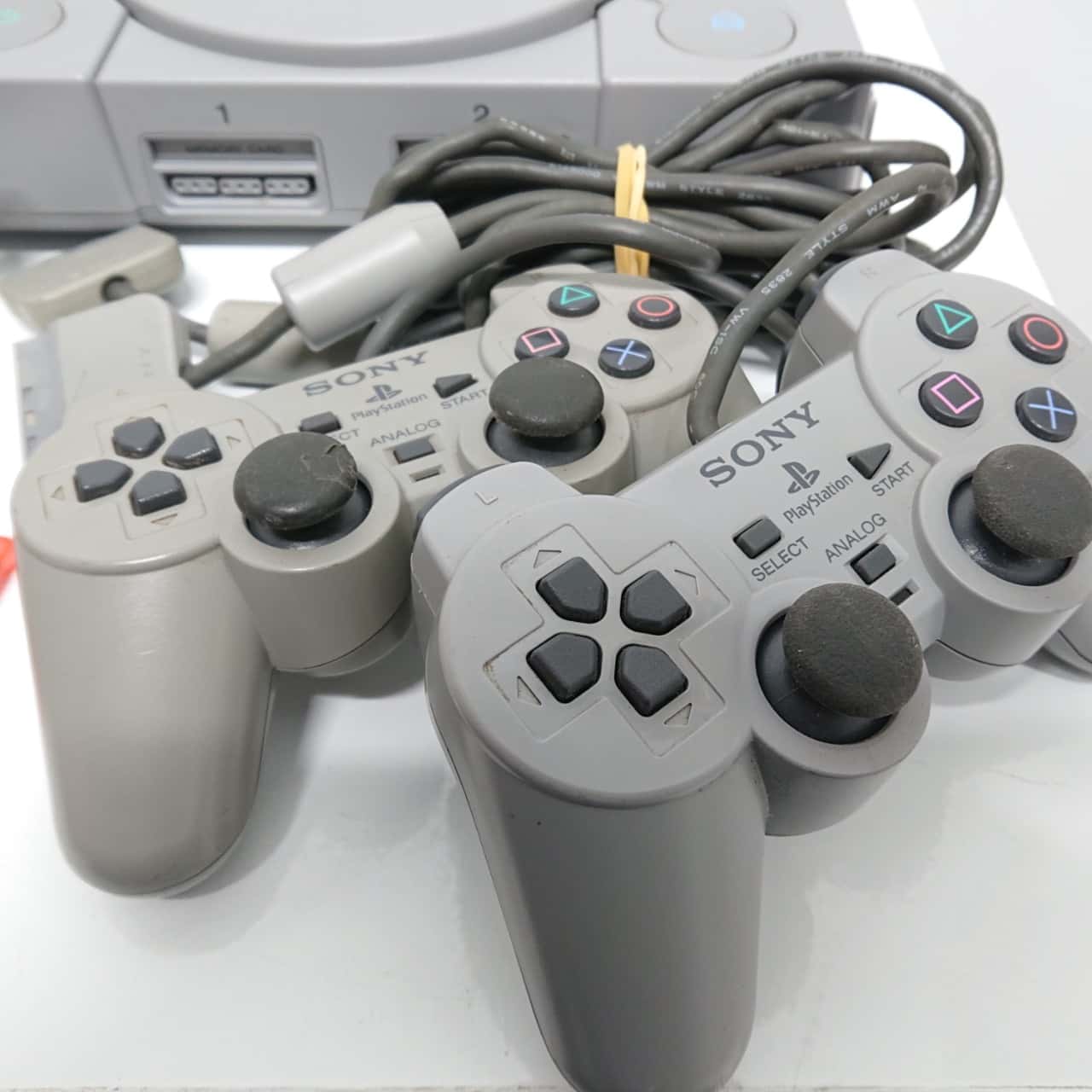 Sony PlayStation Original Game Console with 2 DualShock Controllers