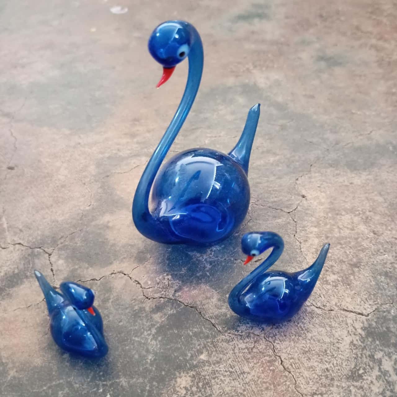 Elegant Blue Glass Swan Family
