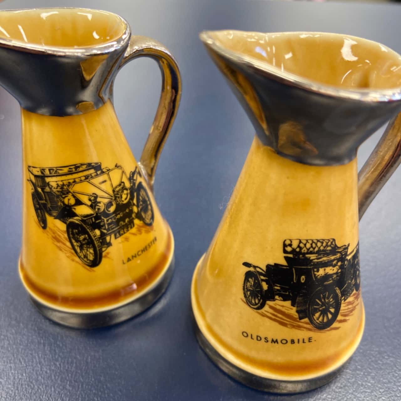 2 small Wade jugs . Vintage Car Club of Great Britain (s)
