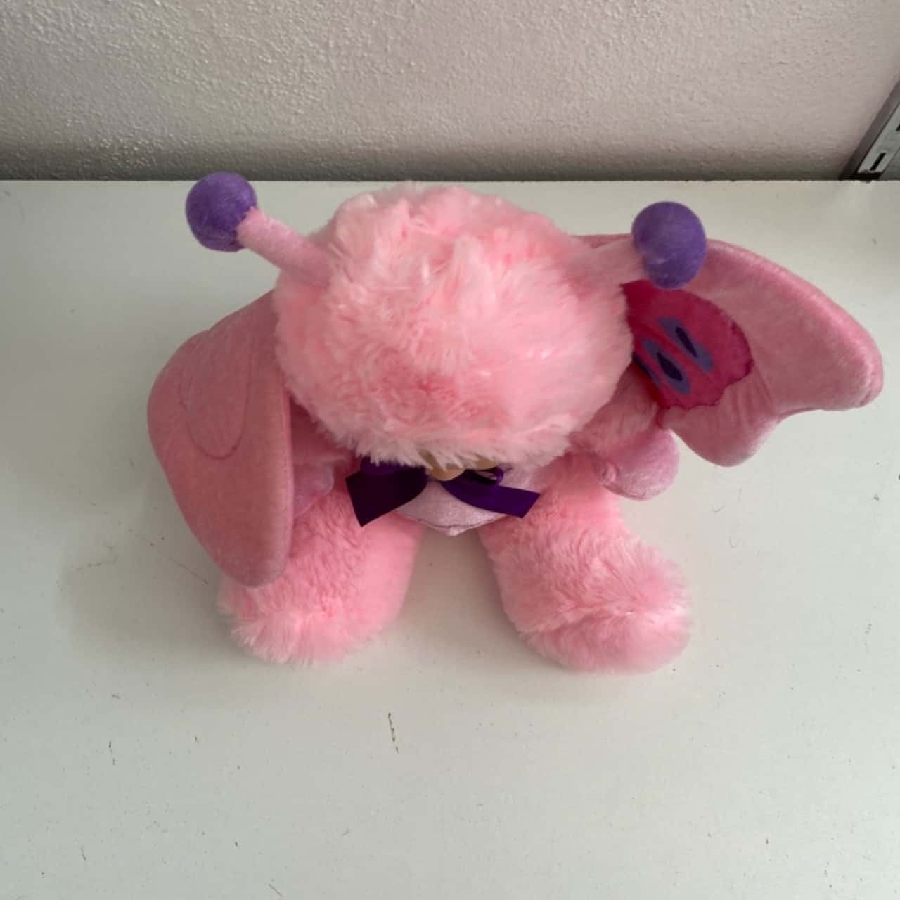 Pink butterfly doll