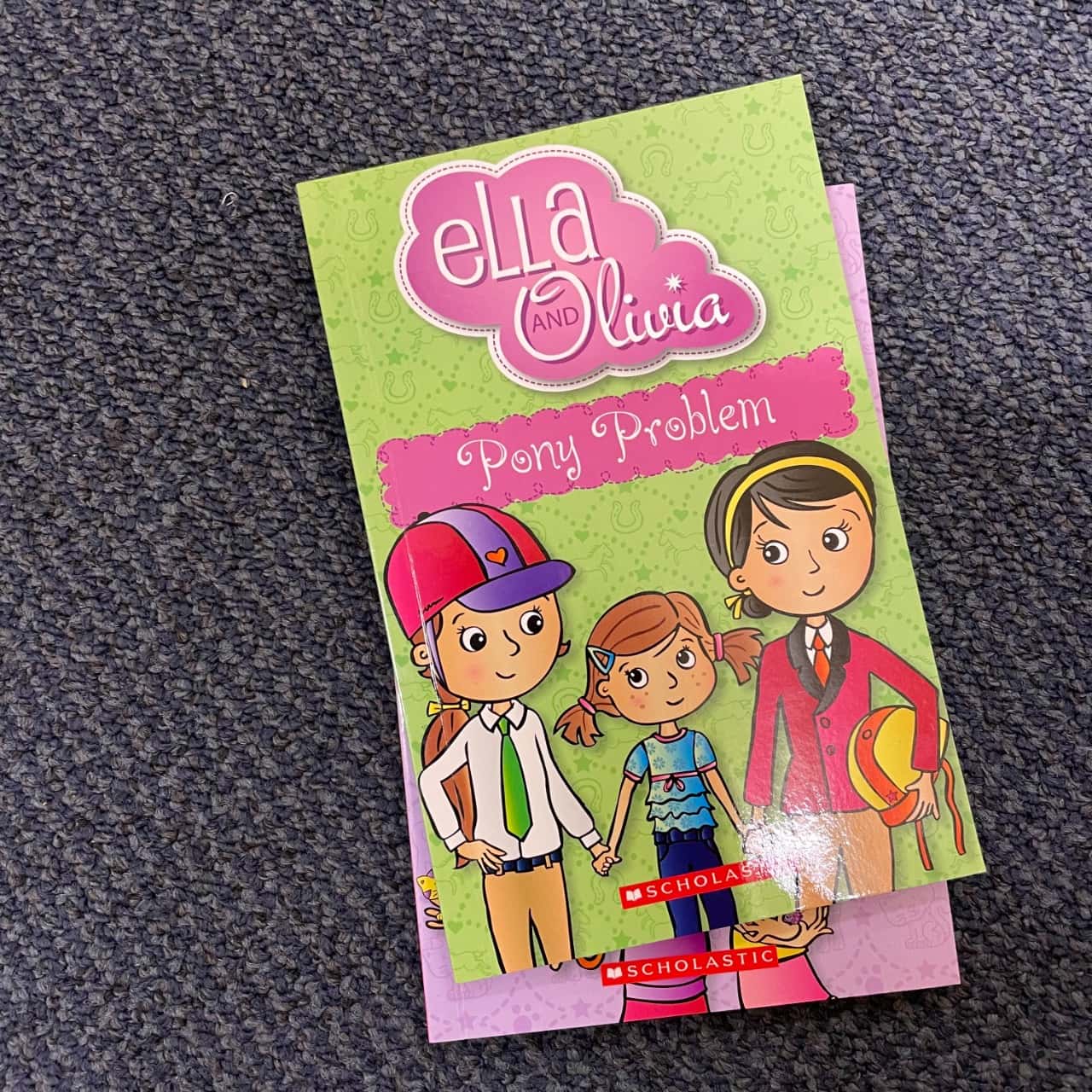 Ella and Olivia. 8 soft cover books in cardboard case. Good condition(s)