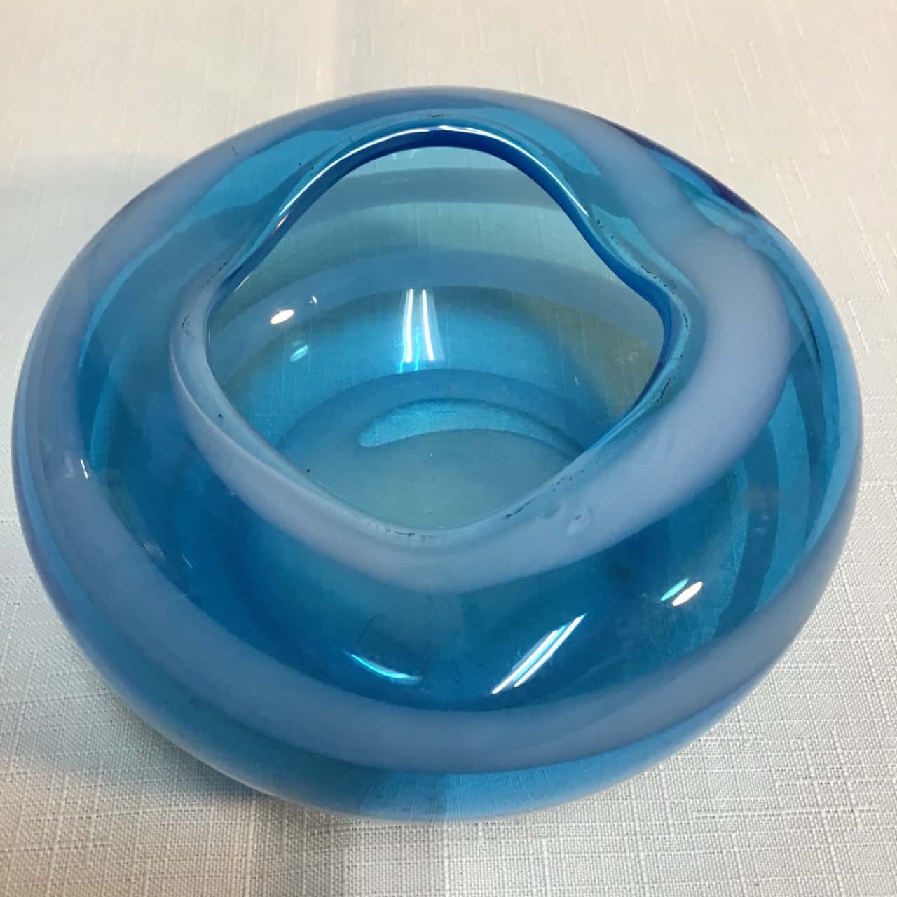 “Reduce “Aqua coloured ashtray(s)