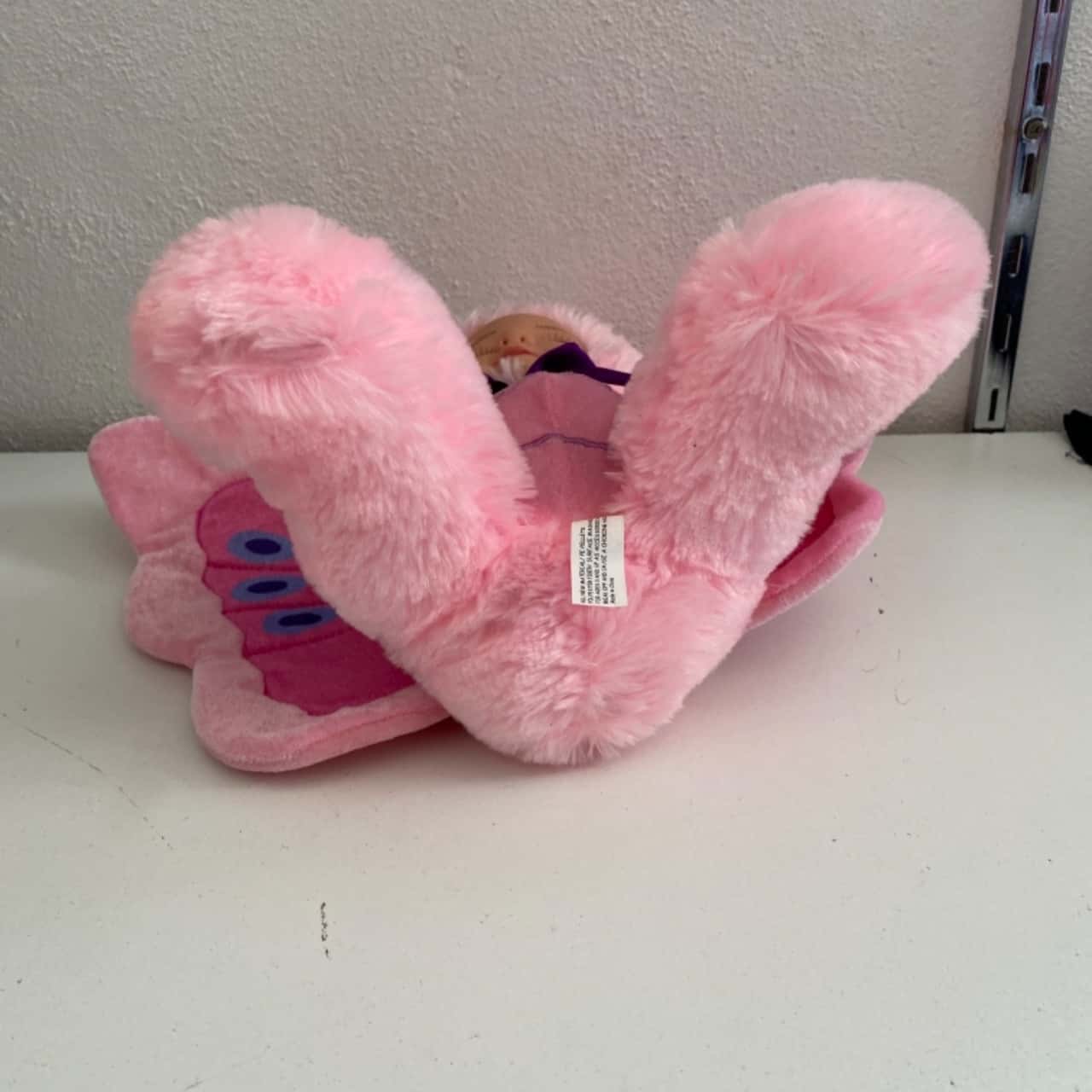Pink butterfly doll