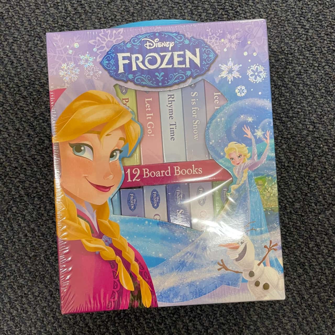 Disney. "Frozen" 12 board books, . New in original shrink wrap.(s)