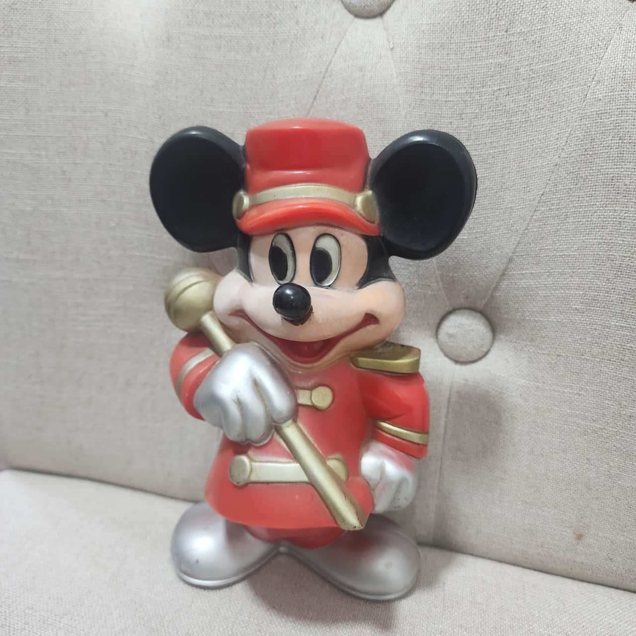 A Vintage Mickey Mouse band leader coin bank(s)