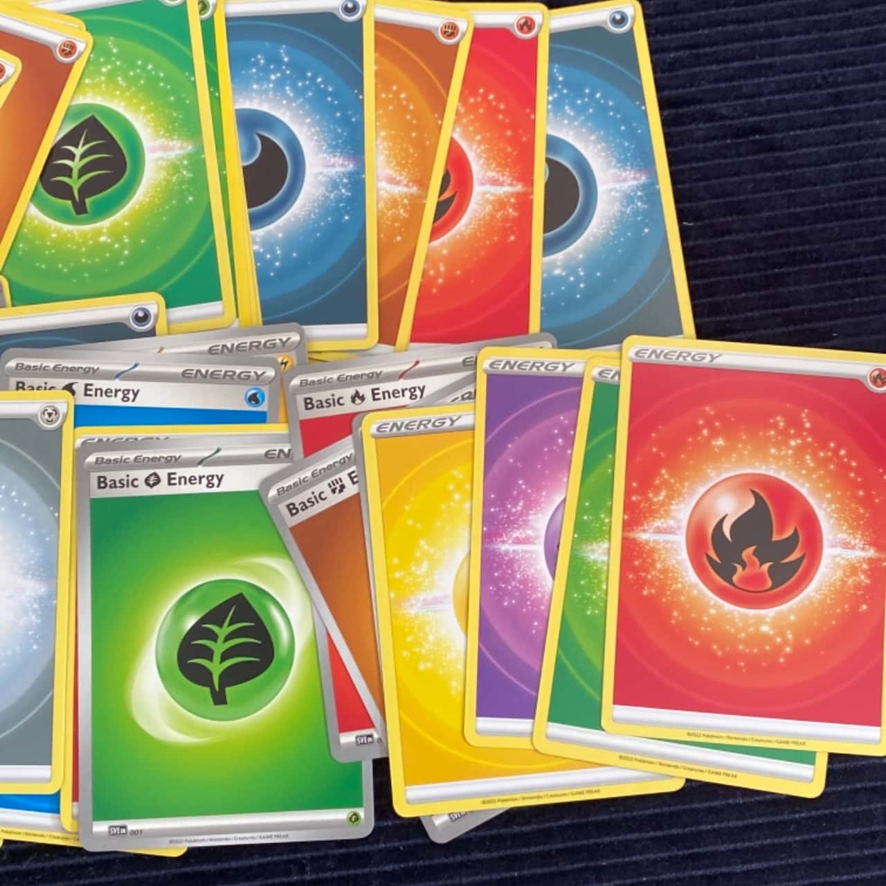 55 energy Pokémon cards + V star card