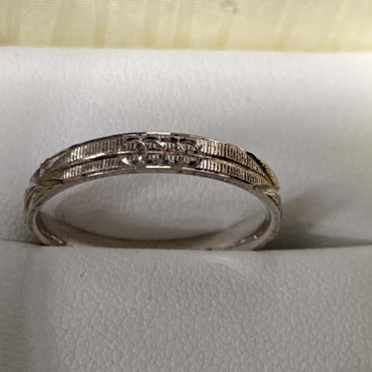 Silver ring stamped 999(s)