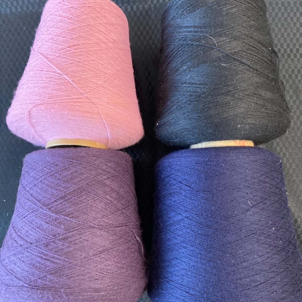 4 Medium Cones Of Assorted Yarn 2.7kg(s)