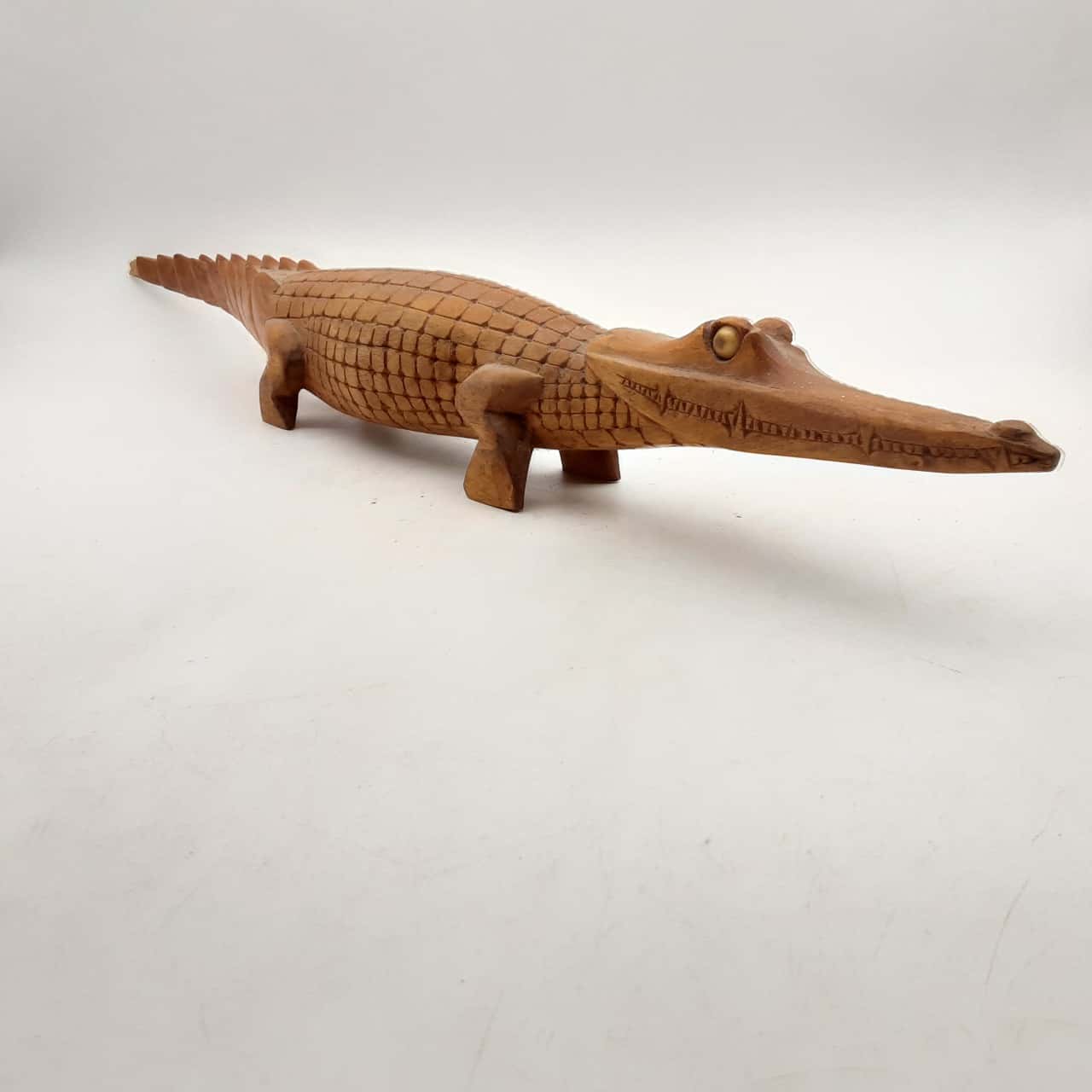 Vintage Primitive Tribal Hand Carved Wooden Crocodile with Shell Eyes