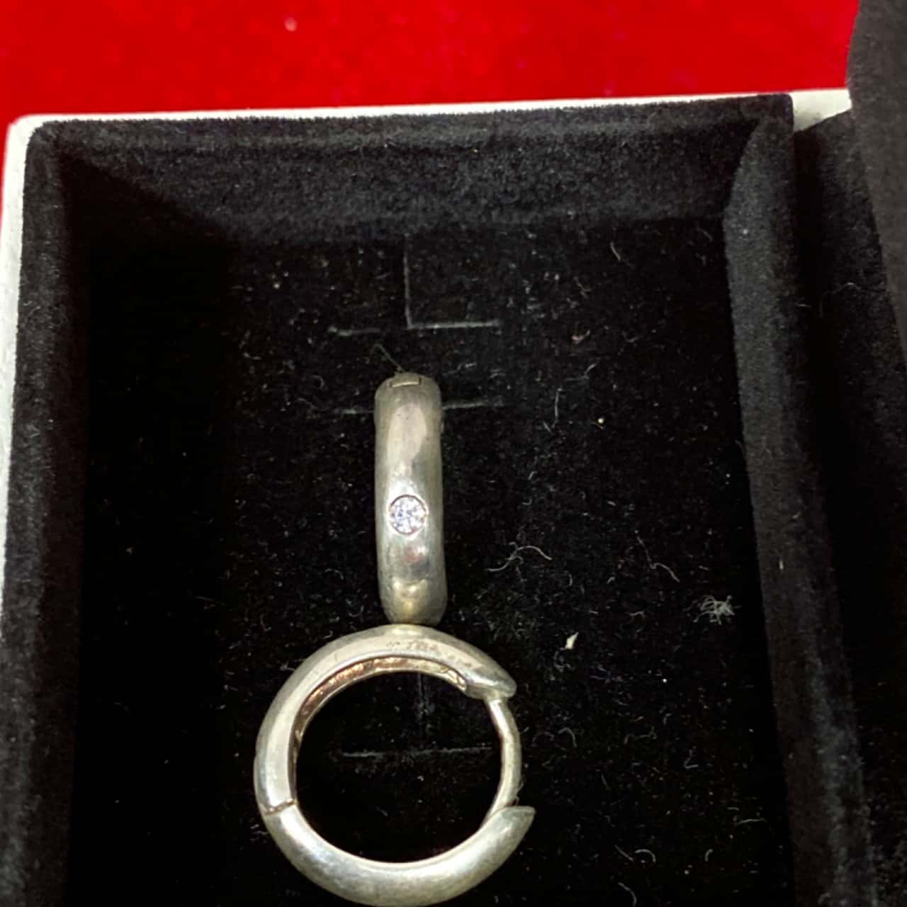 Silver hoops with a sparkling stone(s)