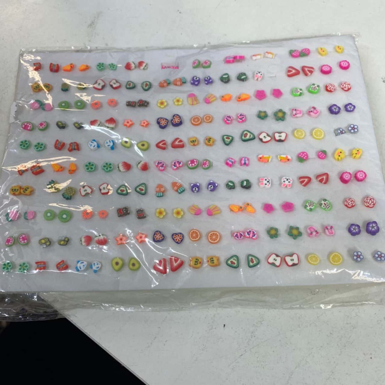 Assorted Pad of 100 Random Earrings (s)