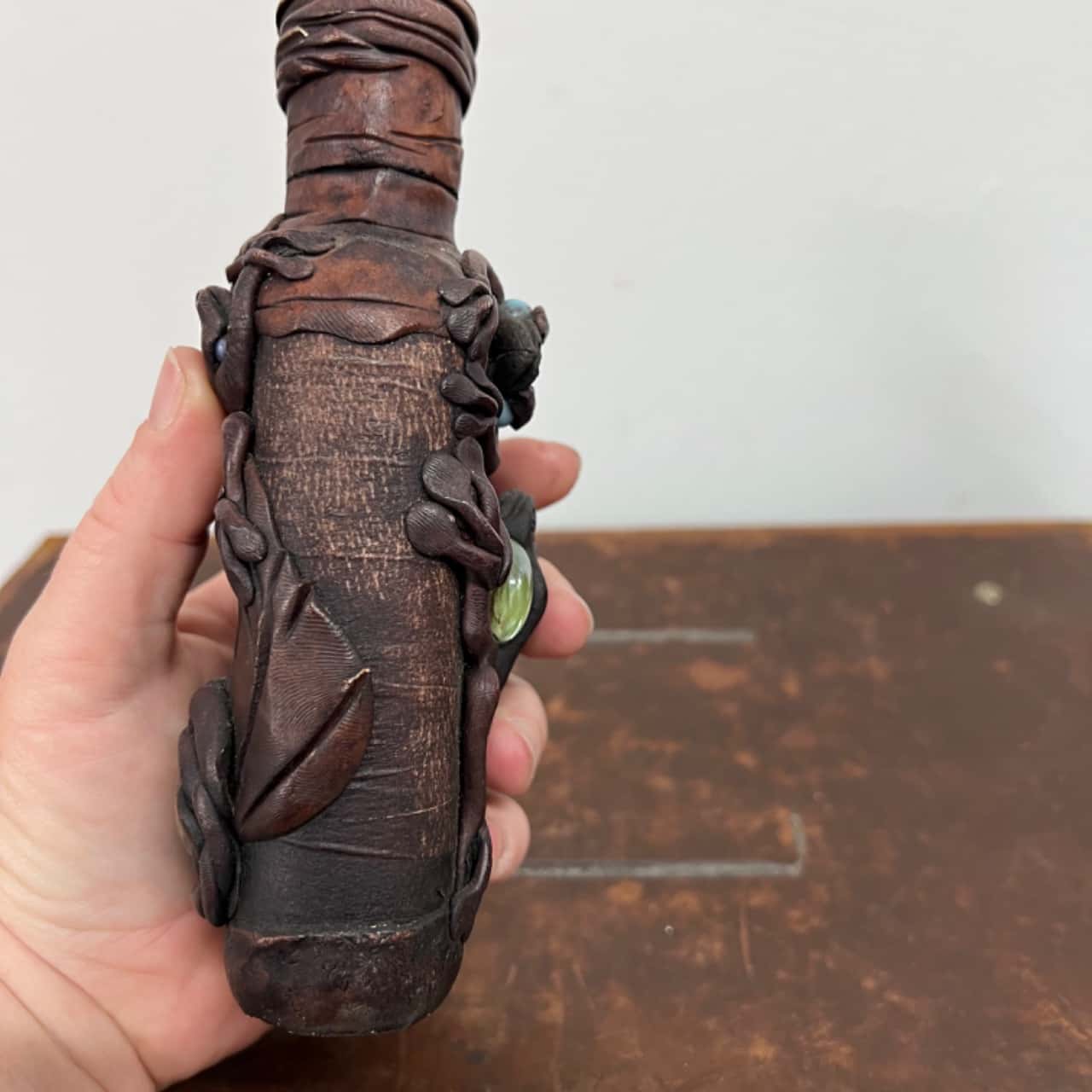 Handmade leather covered bottle with frogs(s)